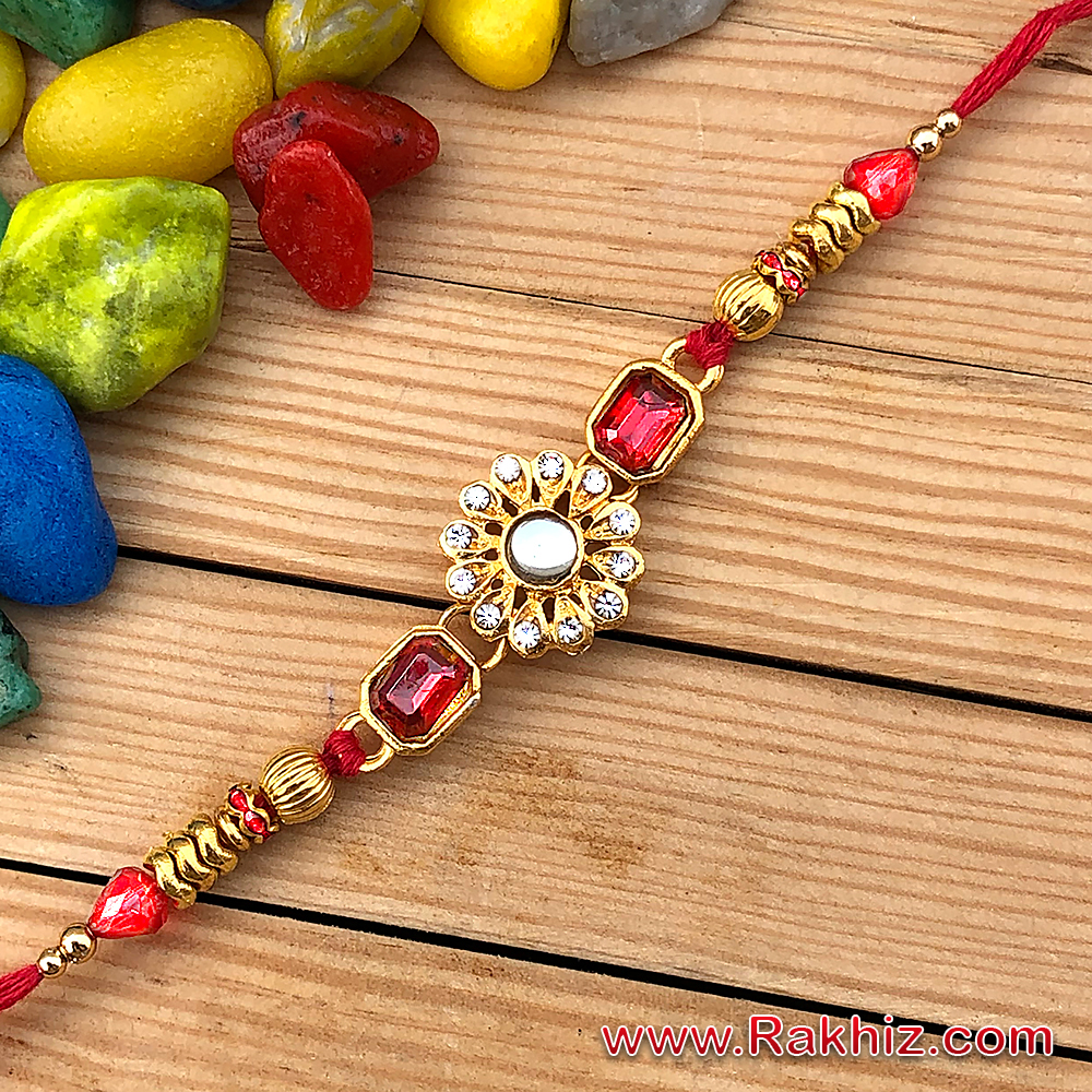 Rich Look Red Stone Studded Diamond Jewel Rakhi with Attractive Packing ...